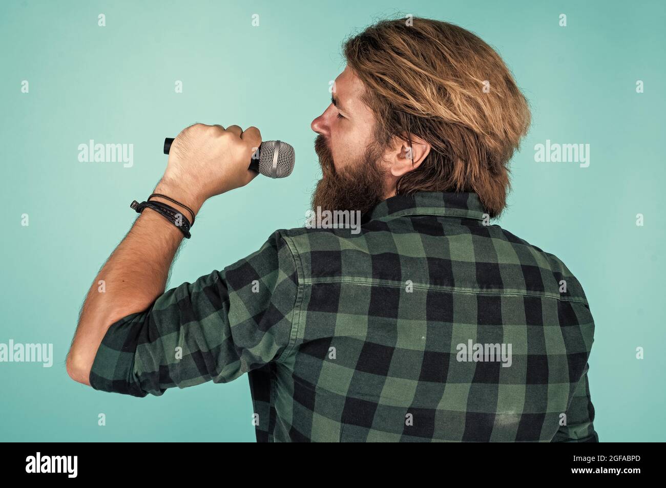 catch the tune. mature charismatic male vocalist. guy with beard ...