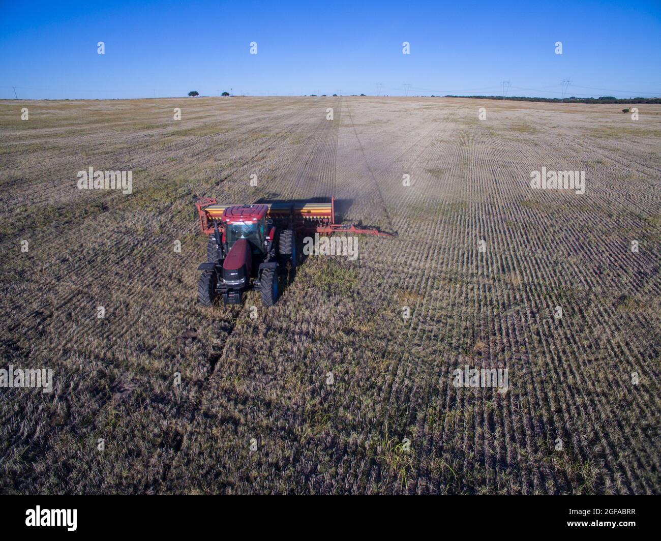 Aerial view of a tractor in direct sowing, in the Argentine field, La ...