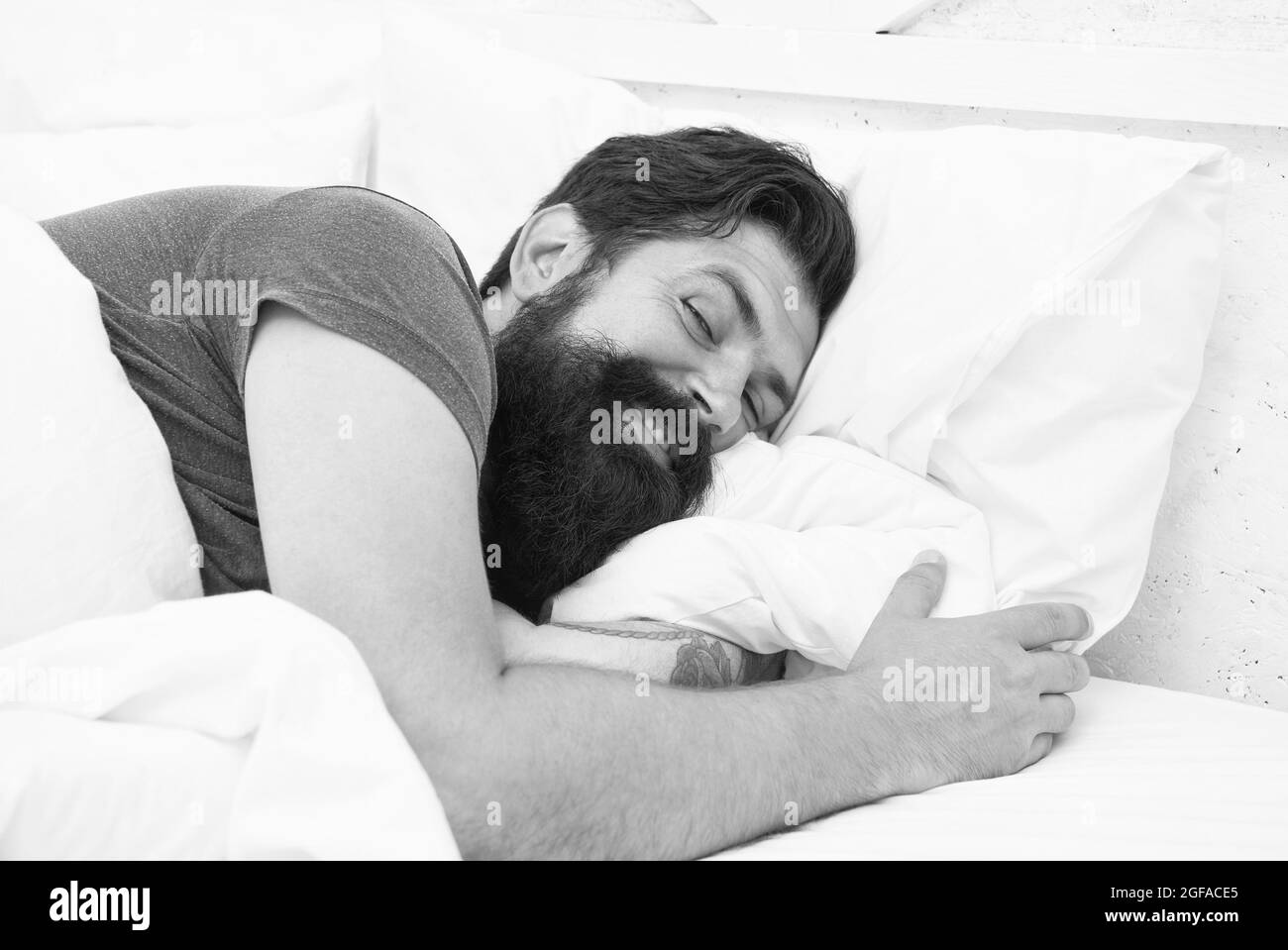 What a great morning. sleepy guy relax in bedroom. early morning ...