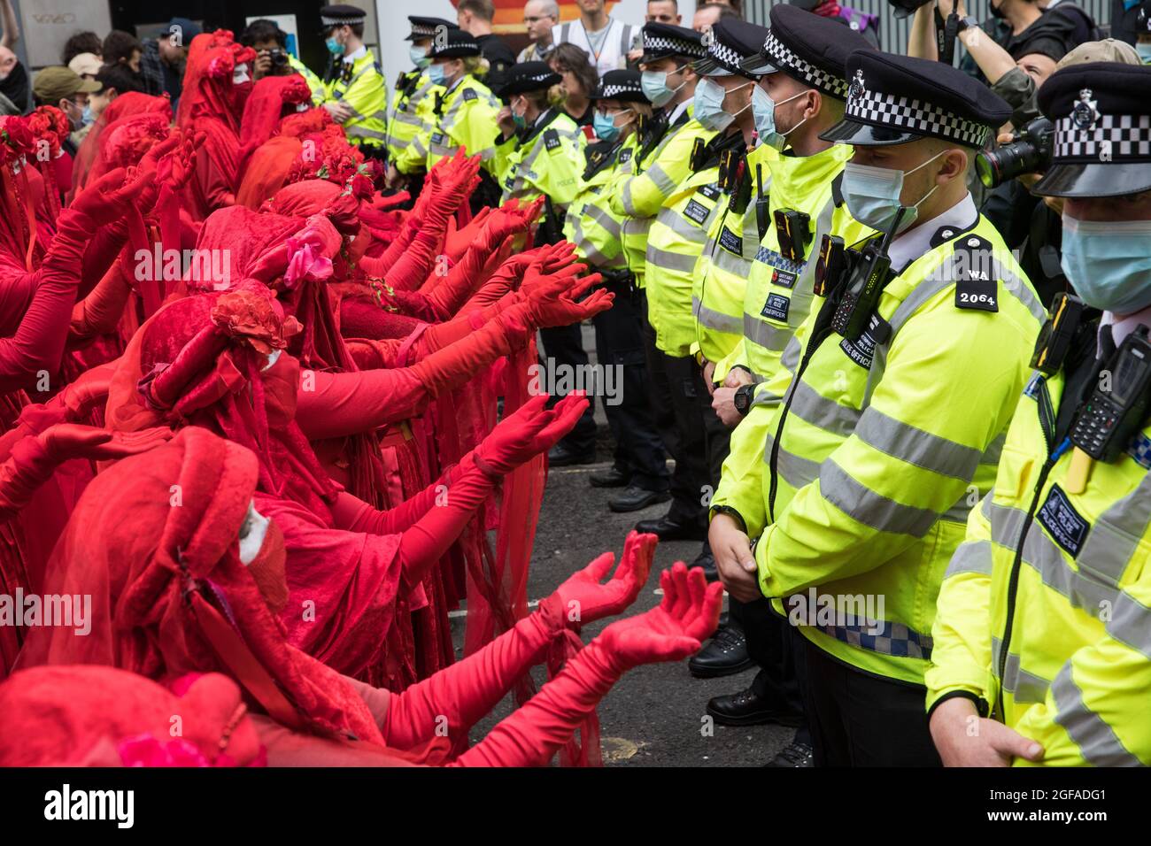 London, UK. 23rd August, 2021. Members of the Extinction Rebellion Red ...