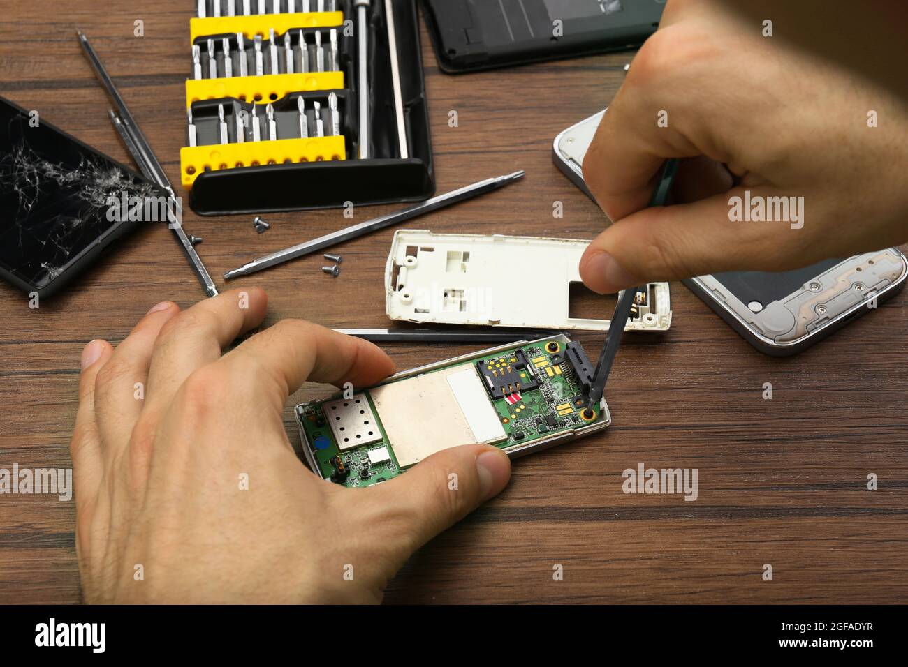 Mobile phone repair, closeup Stock Photo - Alamy