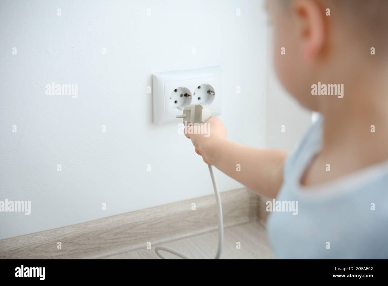 Child switch plug hi-res stock photography and images - Alamy