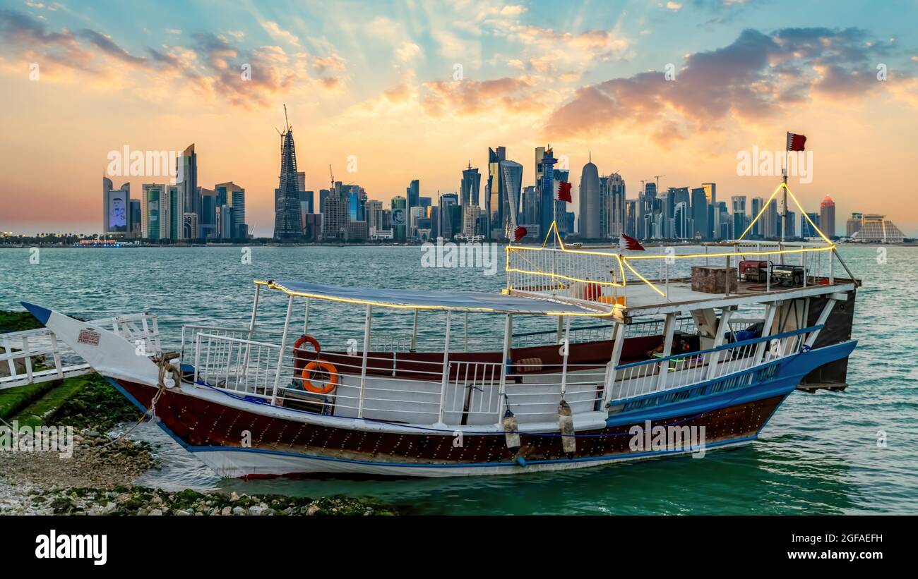 Doha, Qatar - February 2019: Doha Qatar skyline with traditional Qatari ...