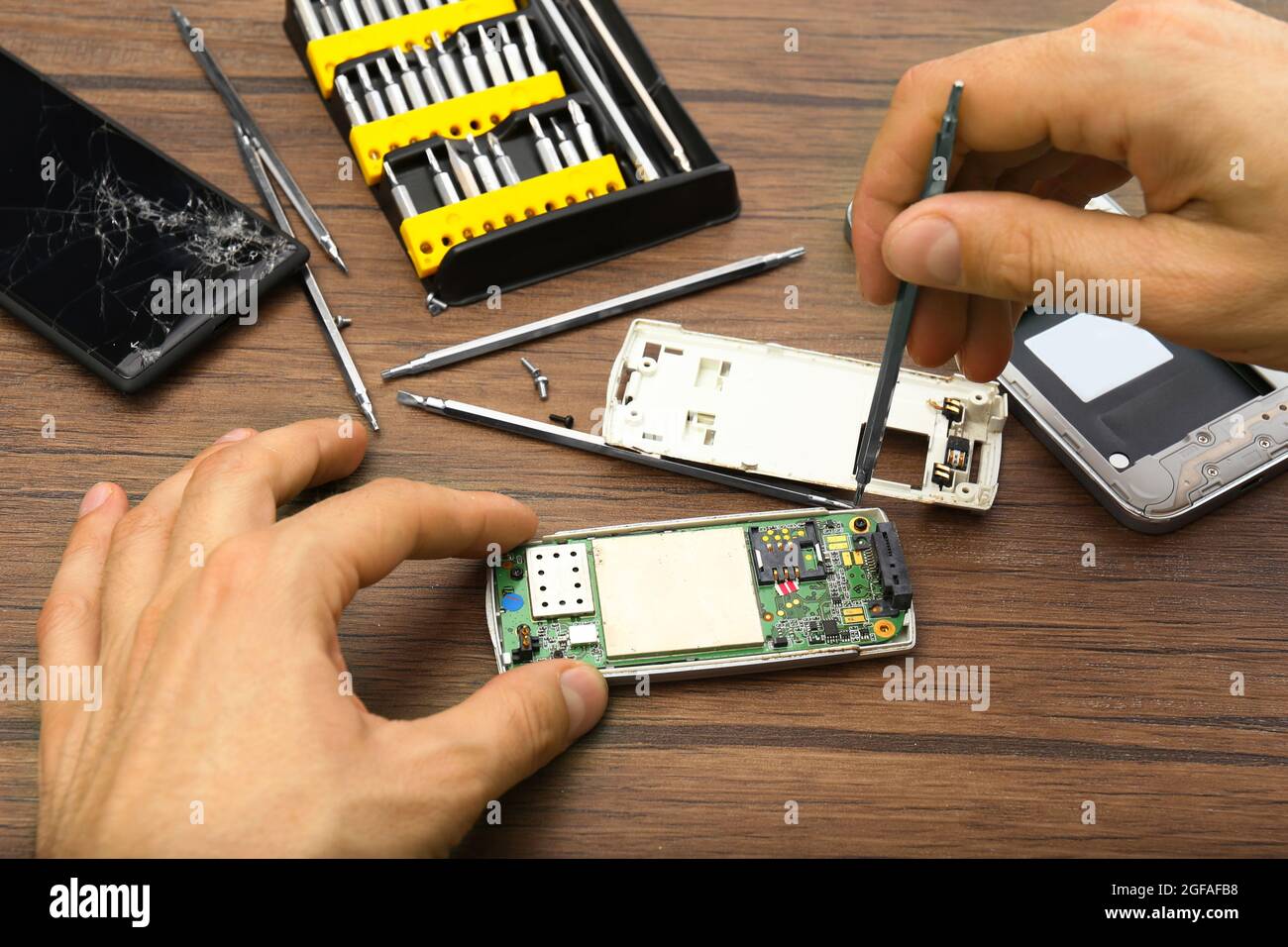 Mobile phone repair, closeup Stock Photo - Alamy