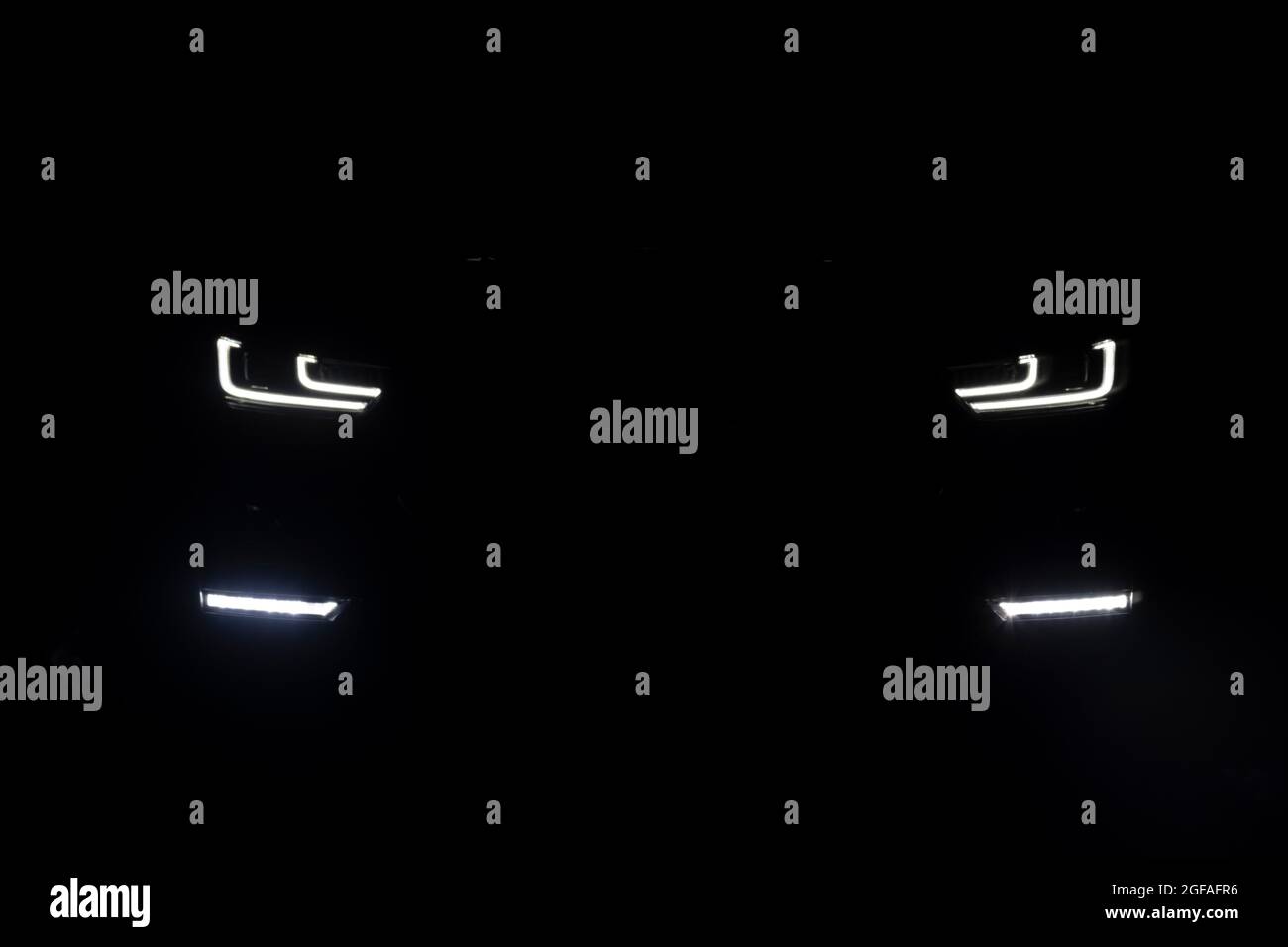 led headlights of a modern car in dark Stock Photo - Alamy