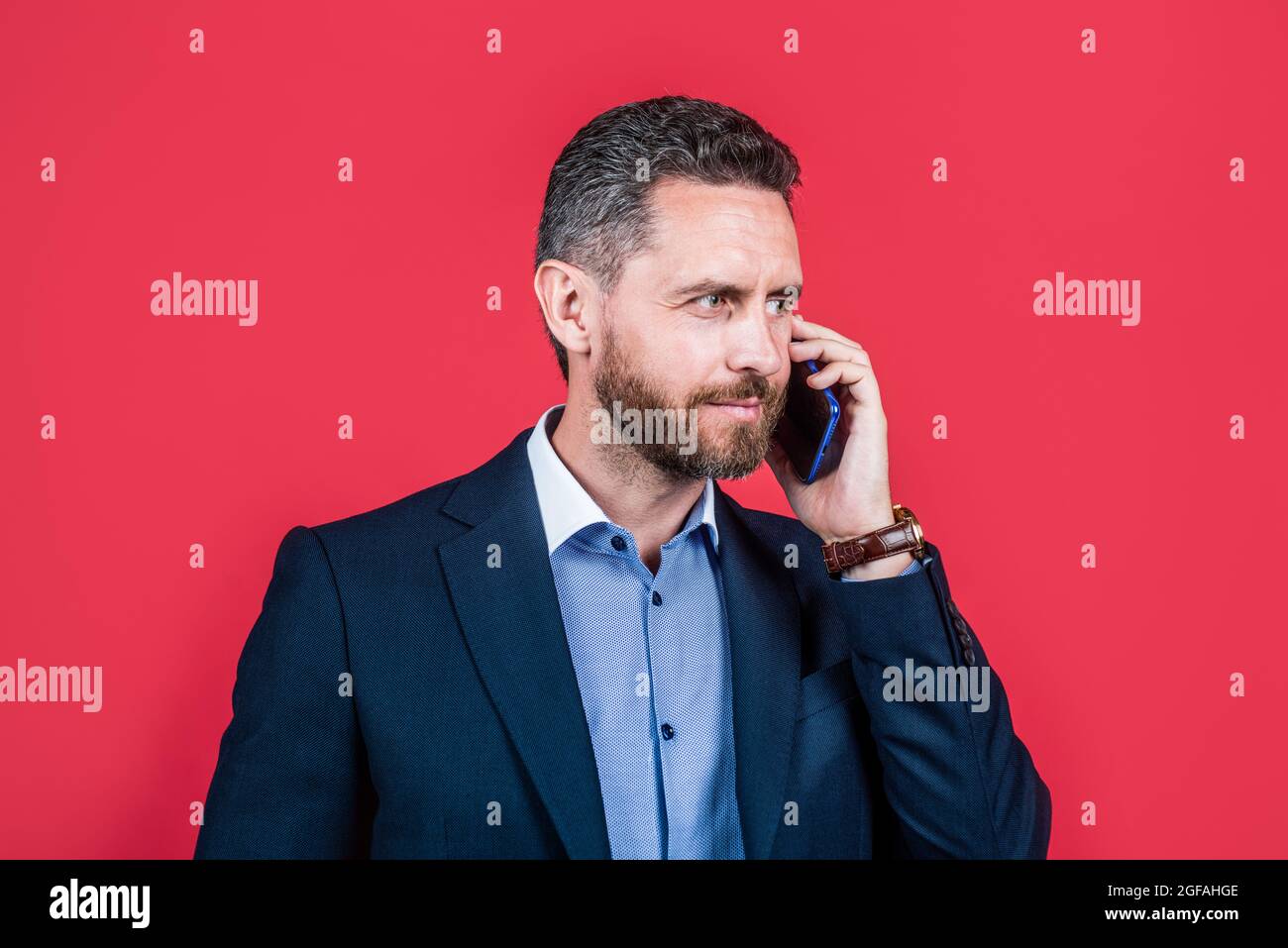 mature ambitious man businessman in businesslike suit talk on phone ...