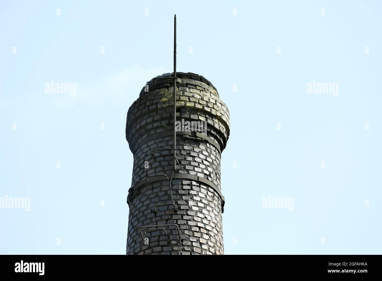 Brick industrial flue on sky background Stock Photo - Alamy