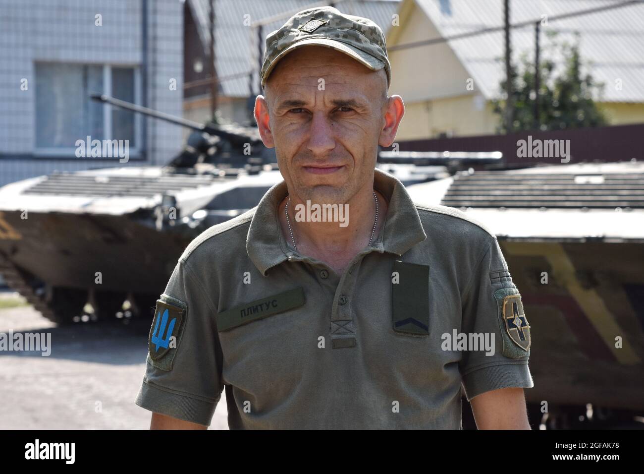 Marinka, Ukraine. 24th Aug, 2021. Ukrainian army soldier posing next to ...