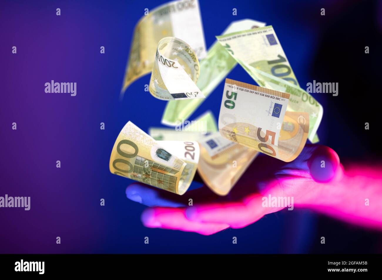 Hand holding a 3D render of floating euro banknotes Stock Photo - Alamy