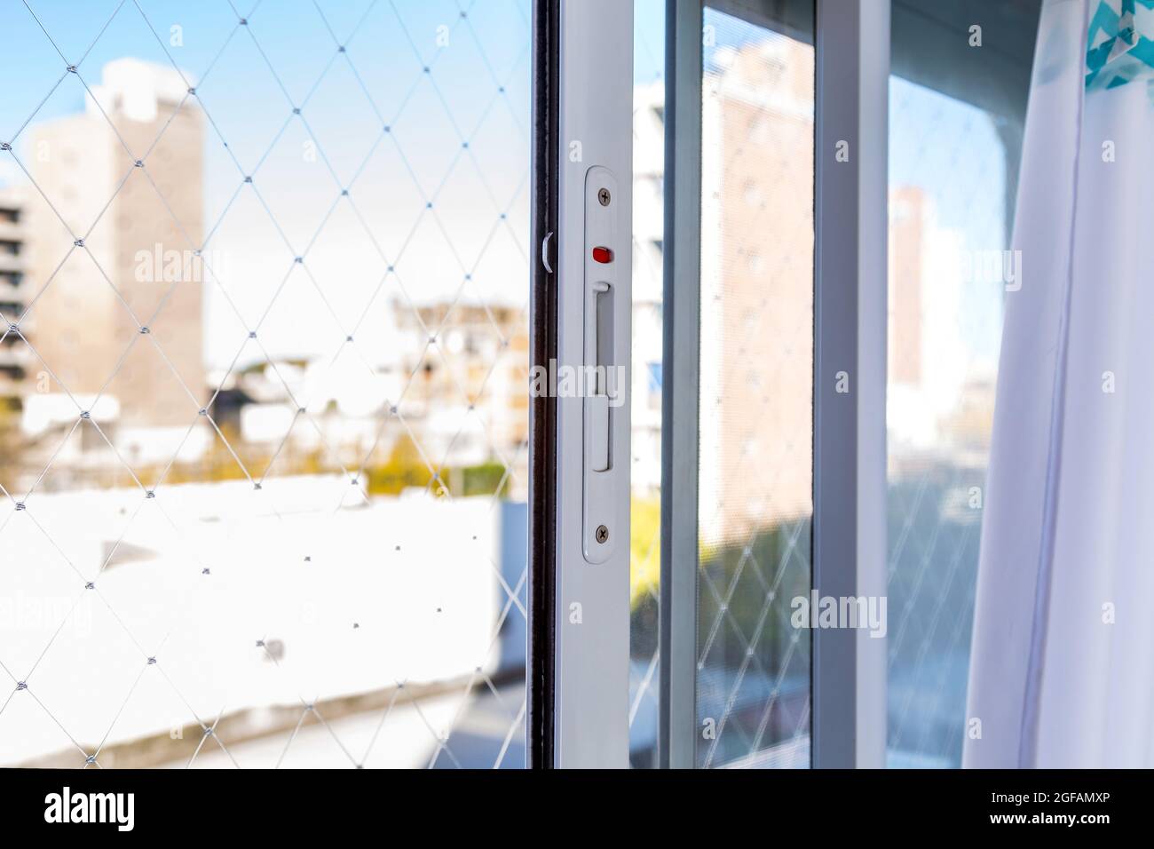 Window aluminium sliding frame and safety net. Child protection net ...