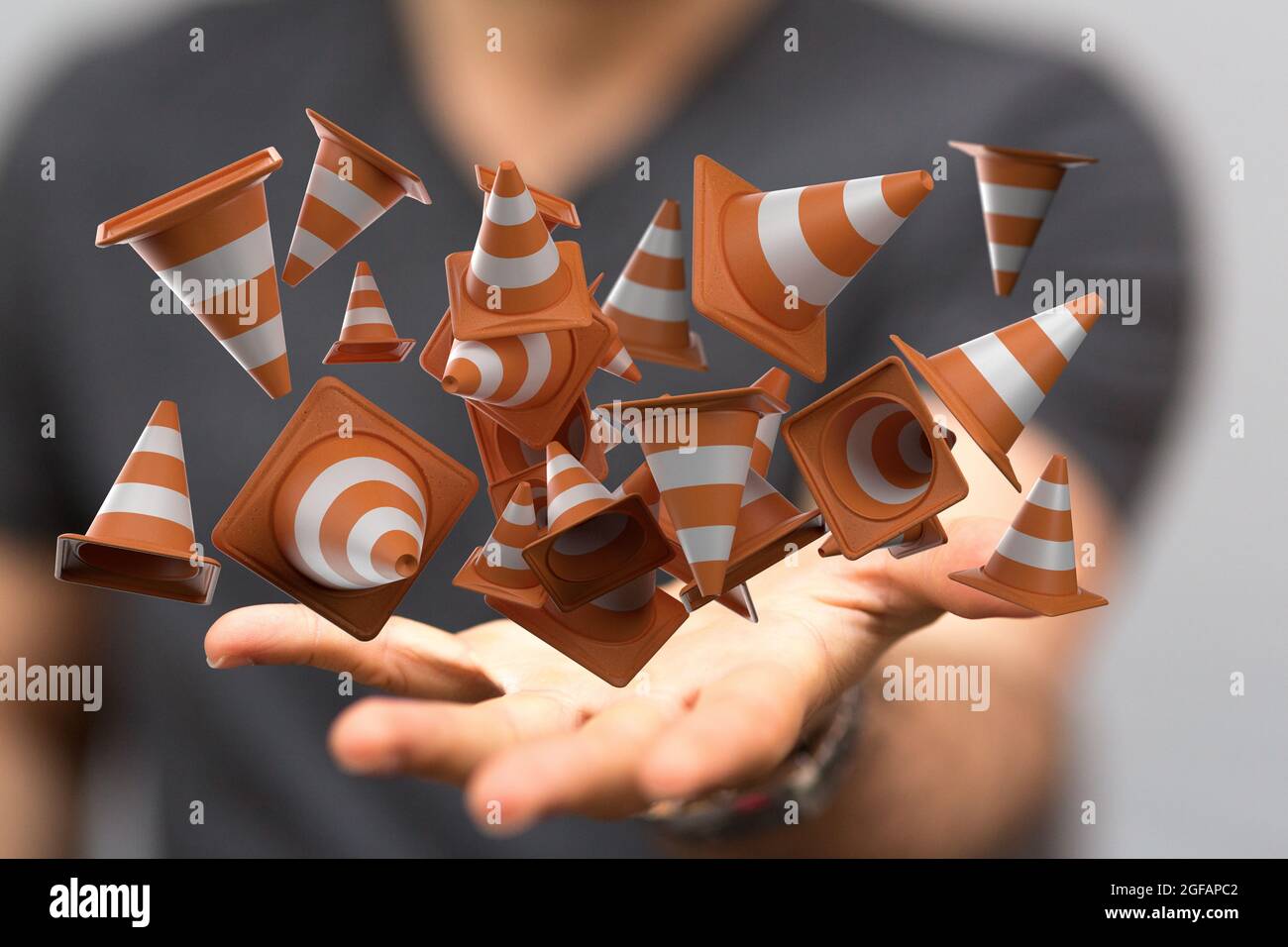 Male's hand holding an illustration for a website being under ...