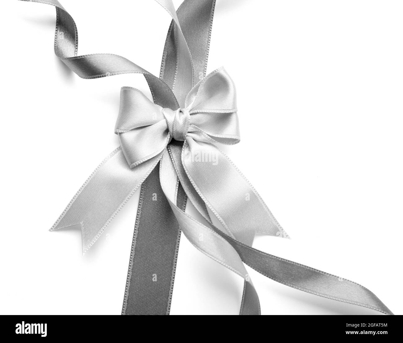 Grey ribbon bow on a white background Stock Photo - Alamy
