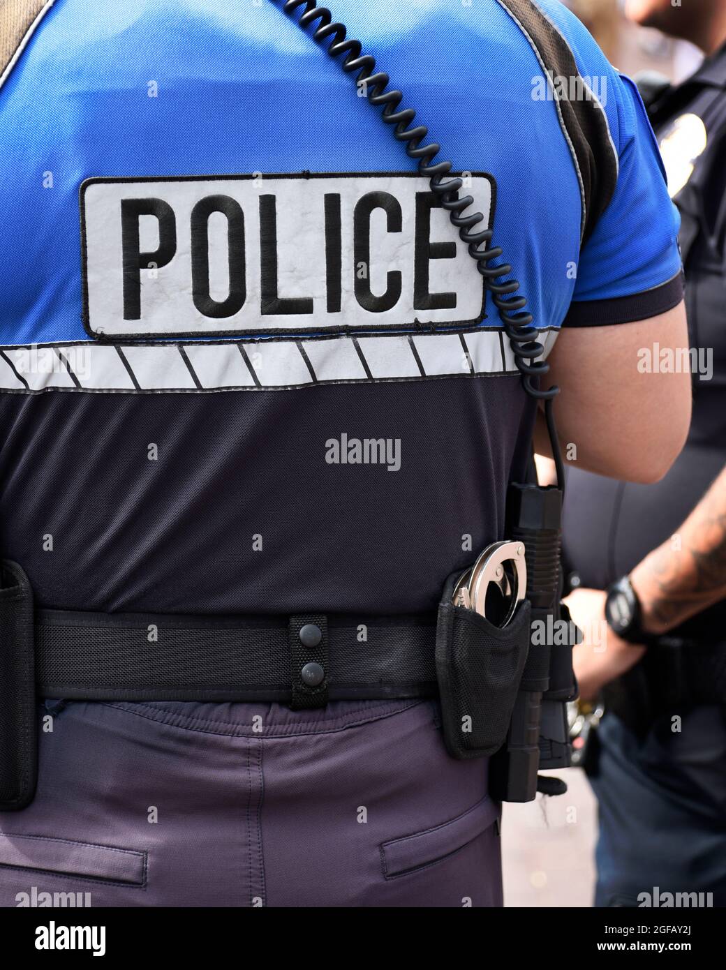 A police officer patrols an outdoor art festival in Santa Fe, New ...