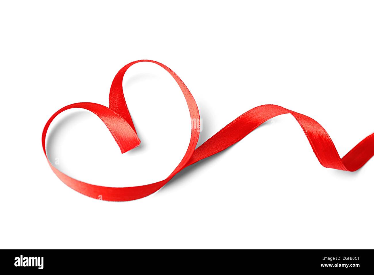 Red heart shaped ribbon isolated on white Stock Photo - Alamy