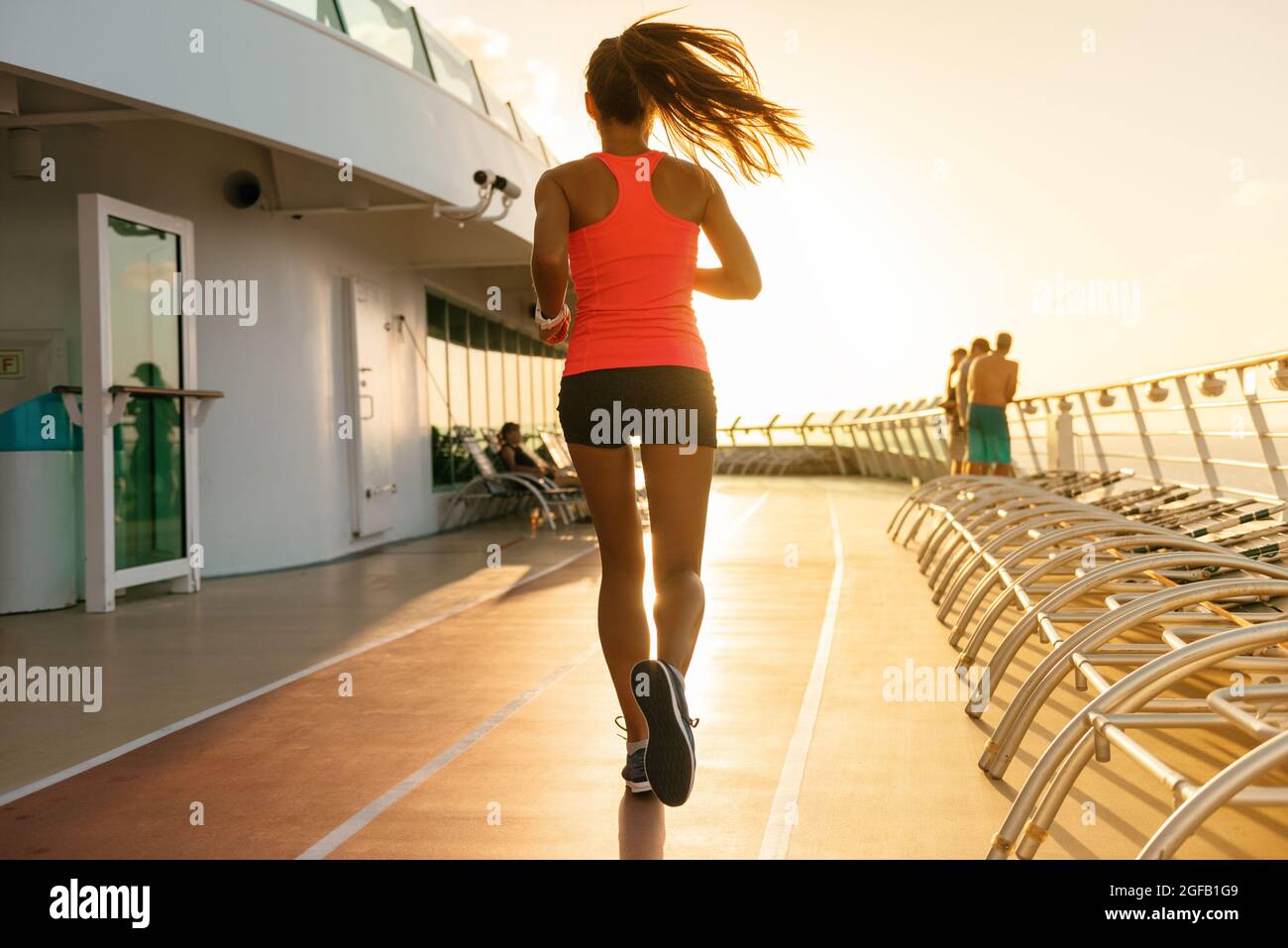Cruise ship fitness exercise woman run jogging on running tracks on ...