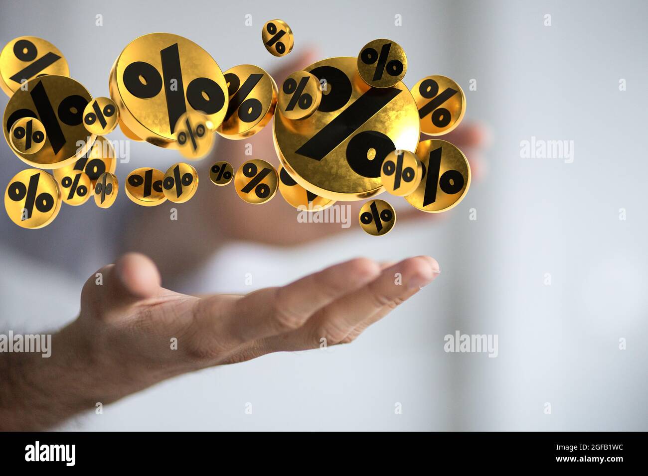 Hand holding a render of yellow percentage signs Stock Photo - Alamy