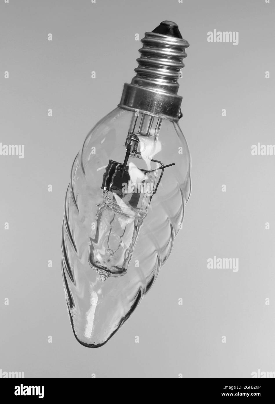 Light bulb on grey background Stock Photo - Alamy