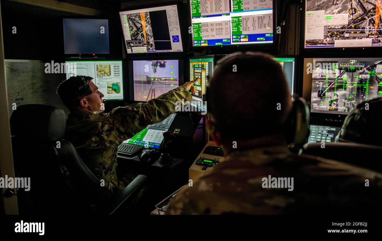 Aircrew from the 489th Attack Squadron perform preflight safety checks ...