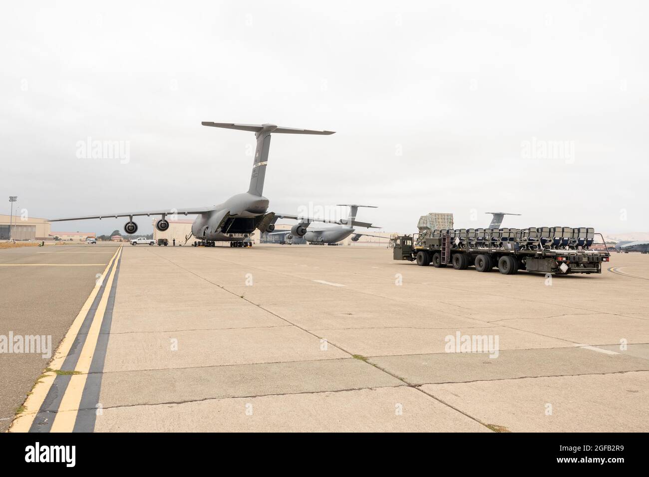 60th Aerial Port Squadron members load KC-10 Extender seat packs into ...