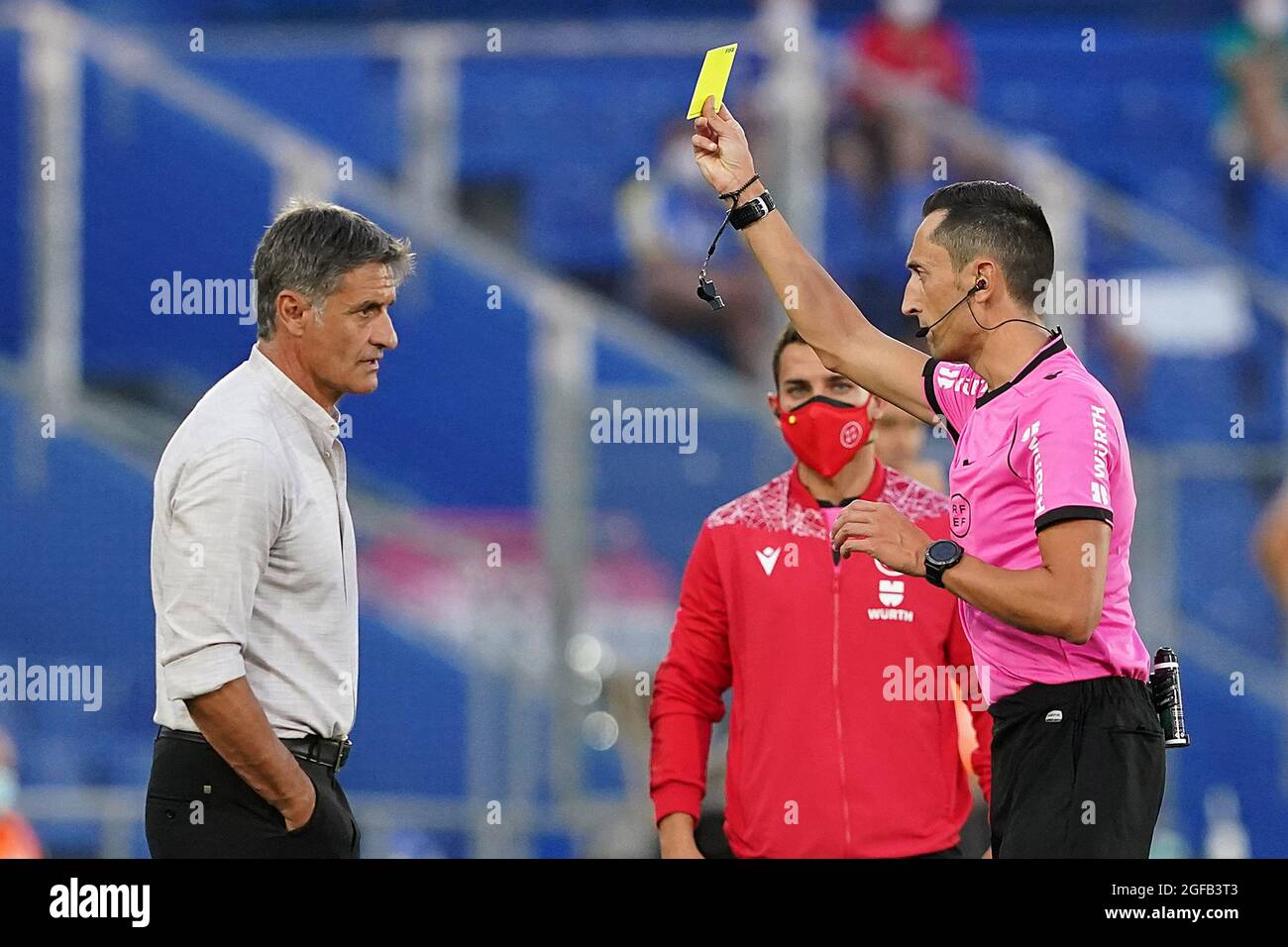 Spanish referee Jose Maria Sanchez Martinez shows yellow card to Getafe ...