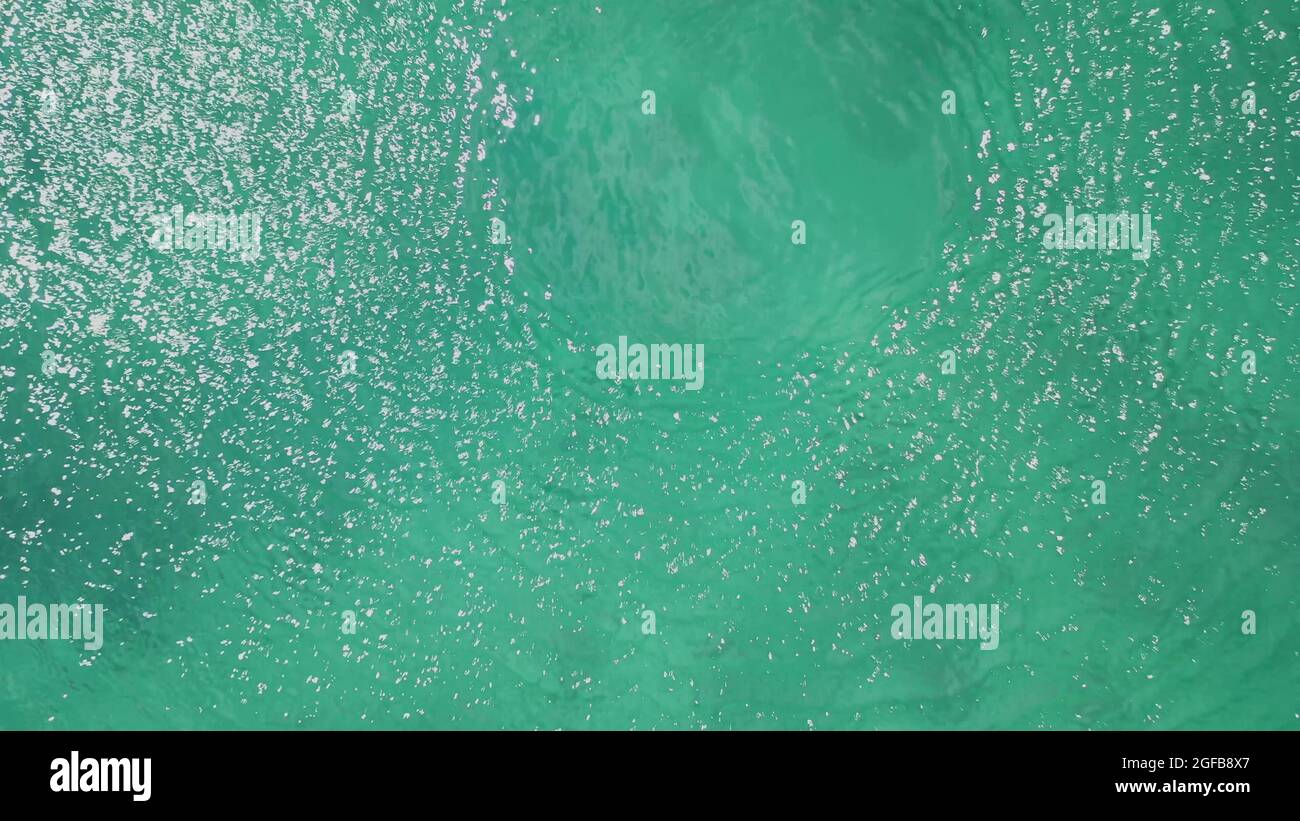 Water surface texture, Slow motion looping clean swimming pool ripples ...