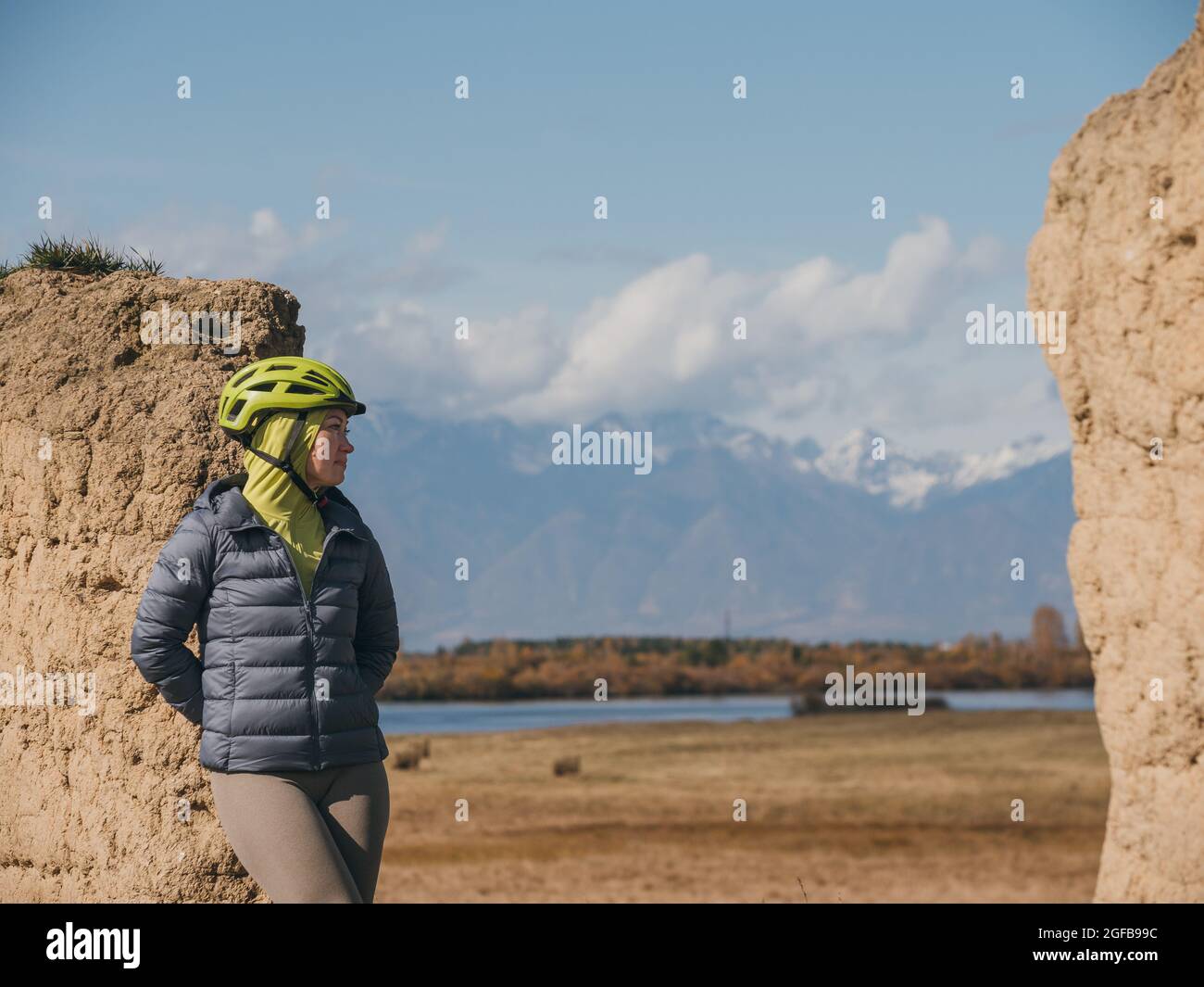 The woman travel on mixed terrain cycle touring with bikepacking. The ...