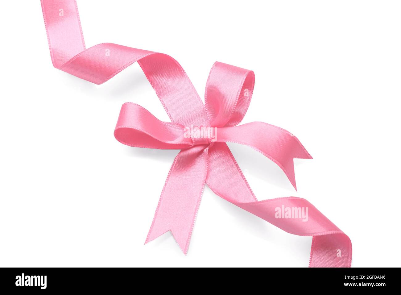 Pink ribbon with bow on white background Stock Photo - Alamy
