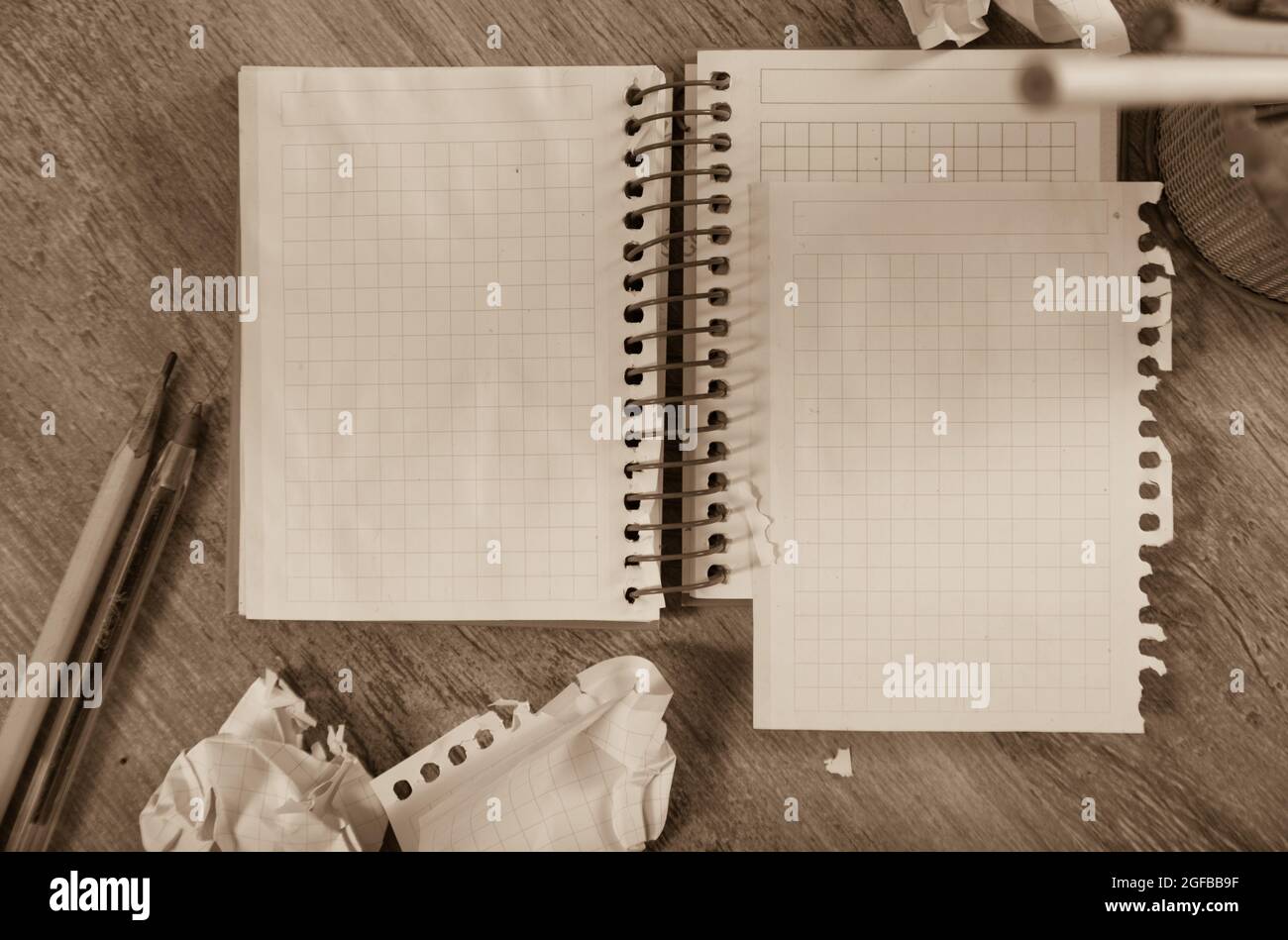 Crumpled pages and notebook Stock Photo - Alamy