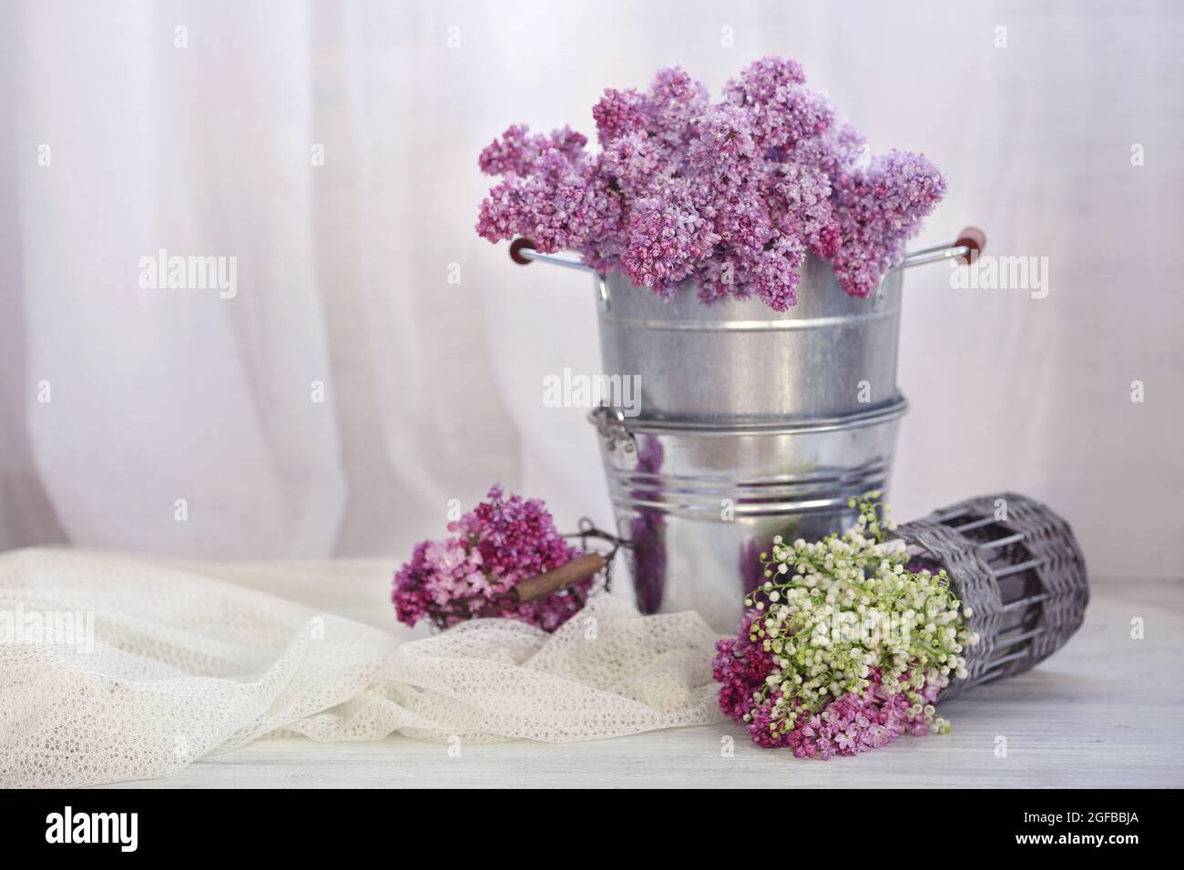 Bouquets of spring flowers on light background Stock Photo - Alamy