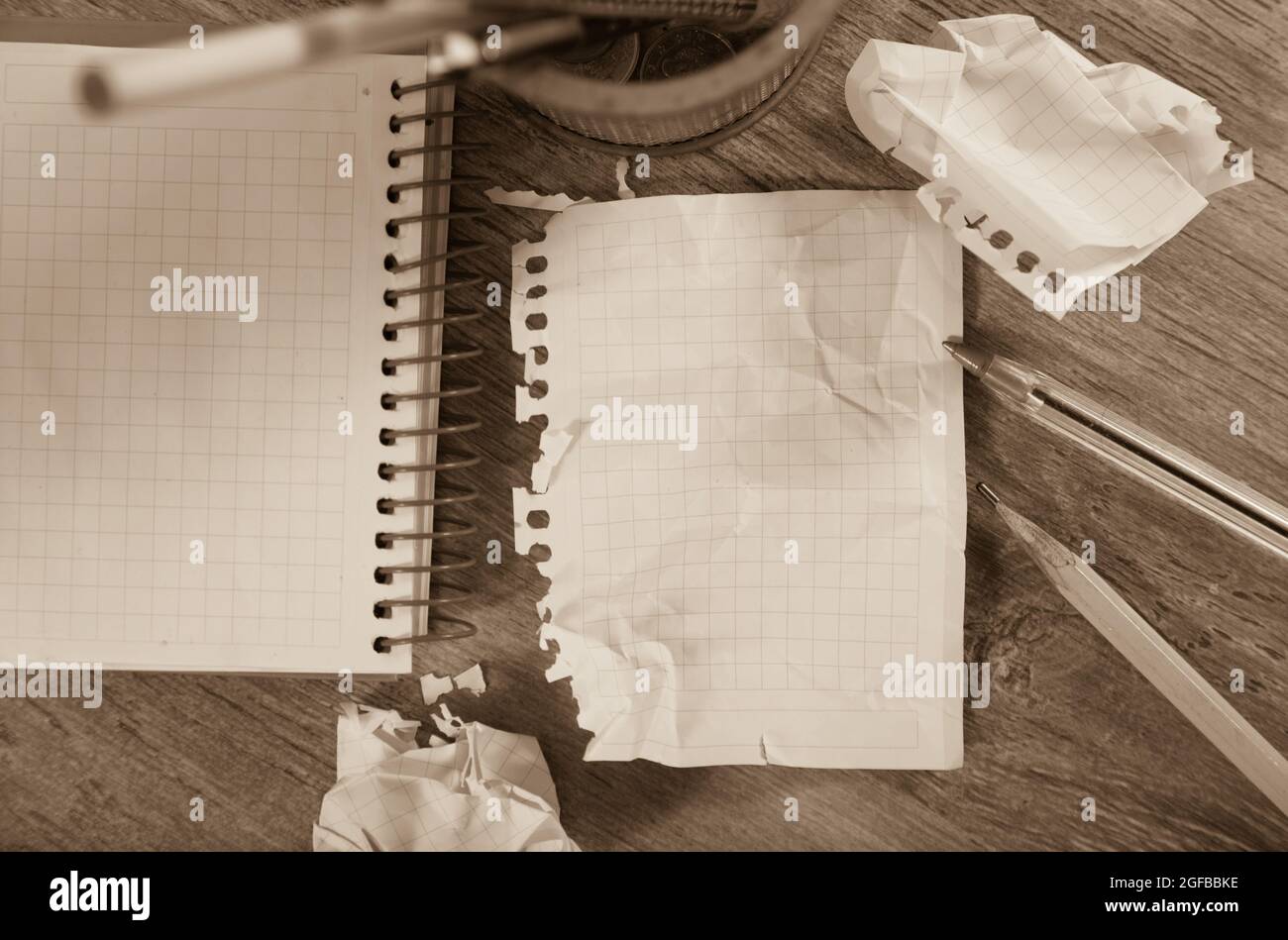 Crumpled pages and notebook Stock Photo - Alamy