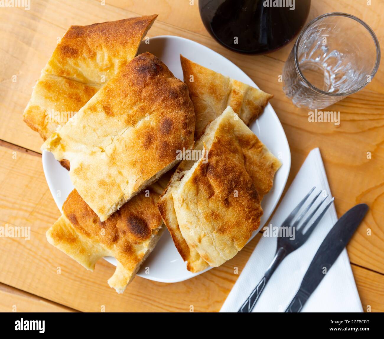 Traditional georgian bread shotis puri served for dinner Stock Photo ...