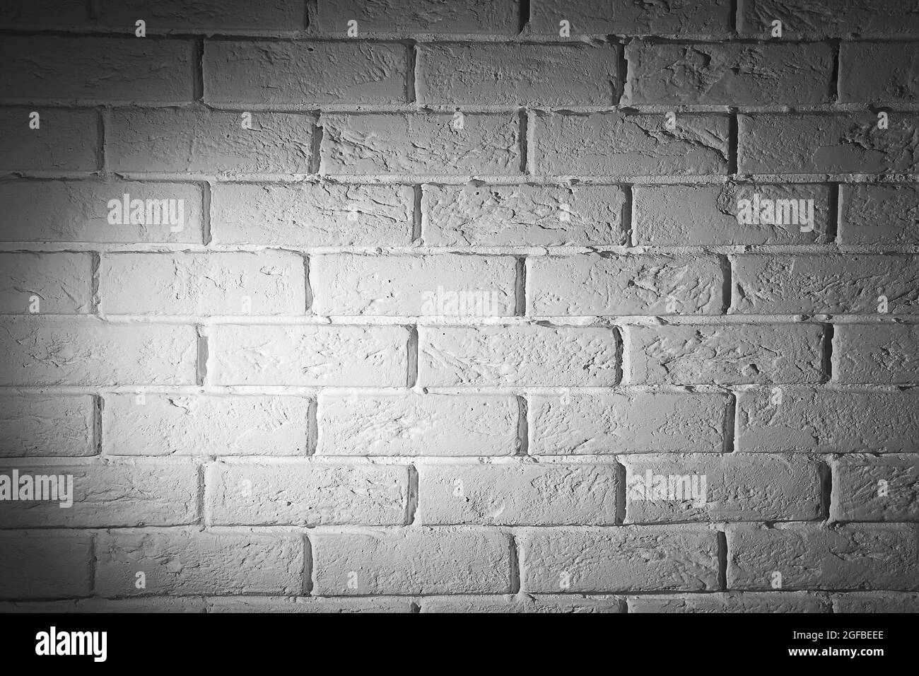 Grey brick wall background with shadow Stock Photo - Alamy