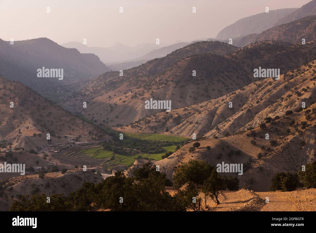 Evening glow of valley at highland, in Zagros mountains, near Ardekan ...