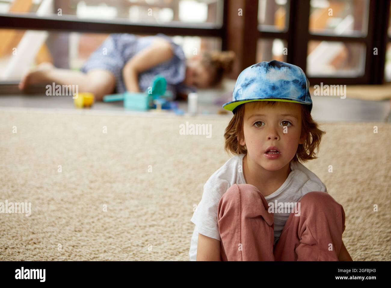Boy on knees hi-res stock photography and images - Alamy
