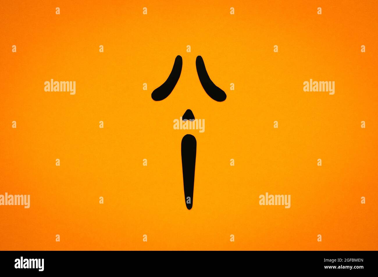 Spooky ghost face with orange background for Halloween minimal ...