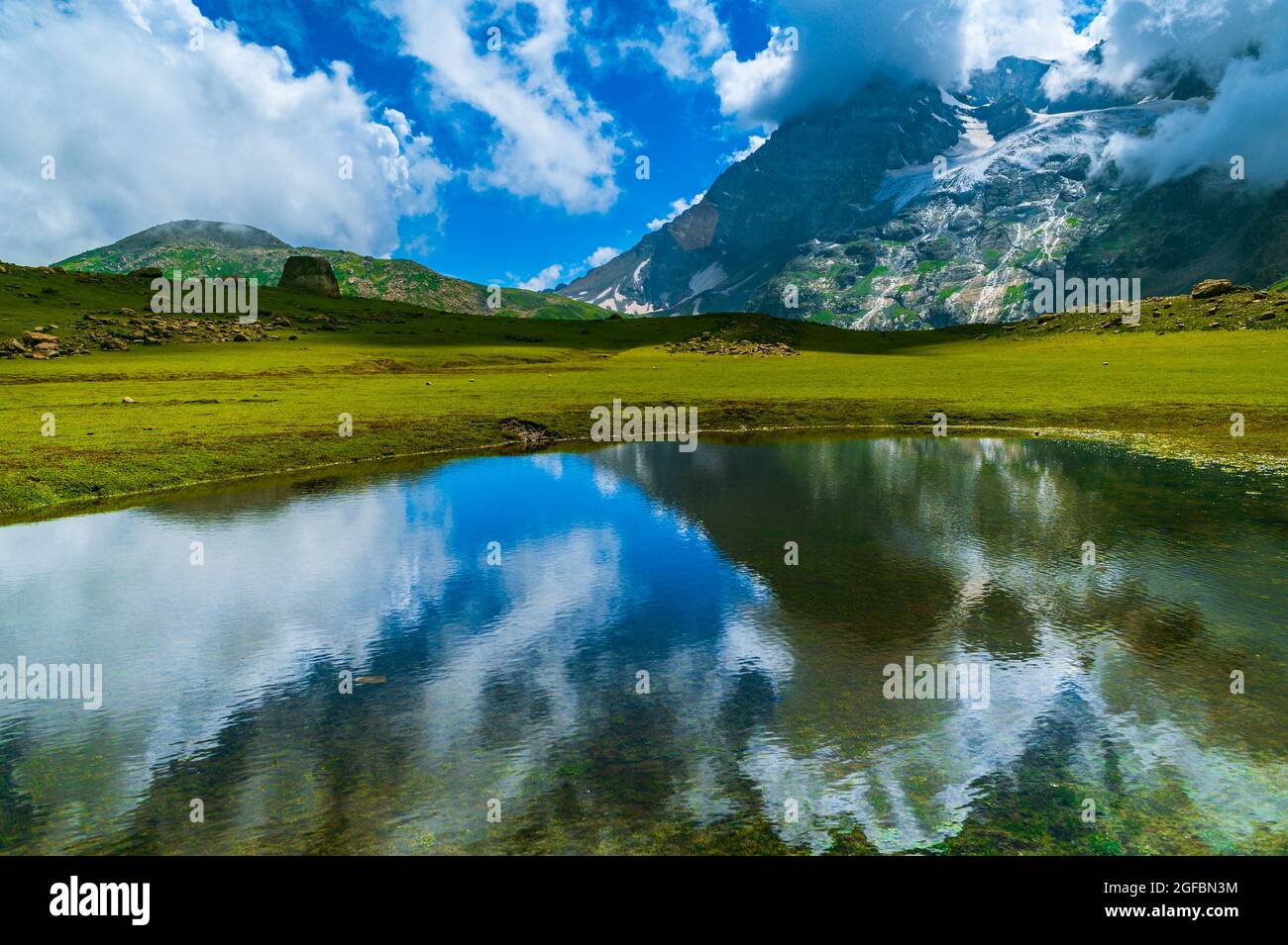 Reflection in water. On the trail of Gangabal Lake and Nundkol Lake at ...
