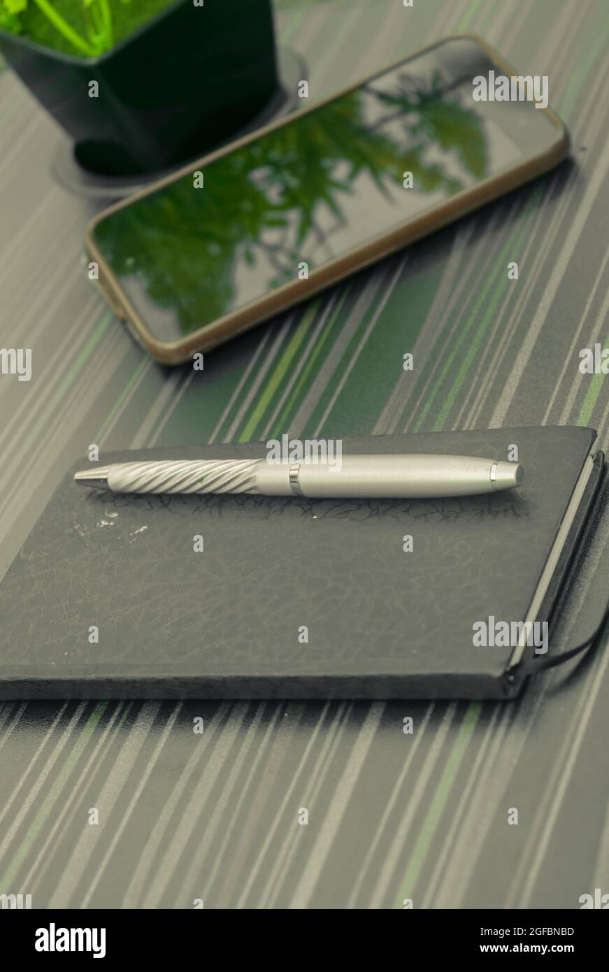 Pen and notebook on office table. Table top view. Corporate business ...