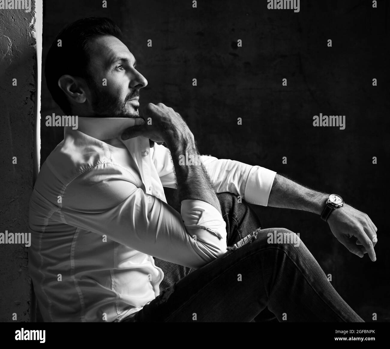 Young handsome person thinking Black and White Stock Photos & Images ...