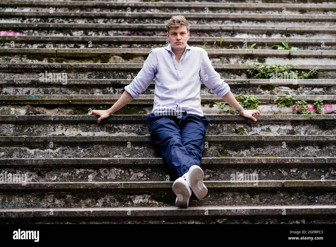 Mannheim, Germany. 13th Aug, 2021. Actor Helgi Schmid sits on a ...