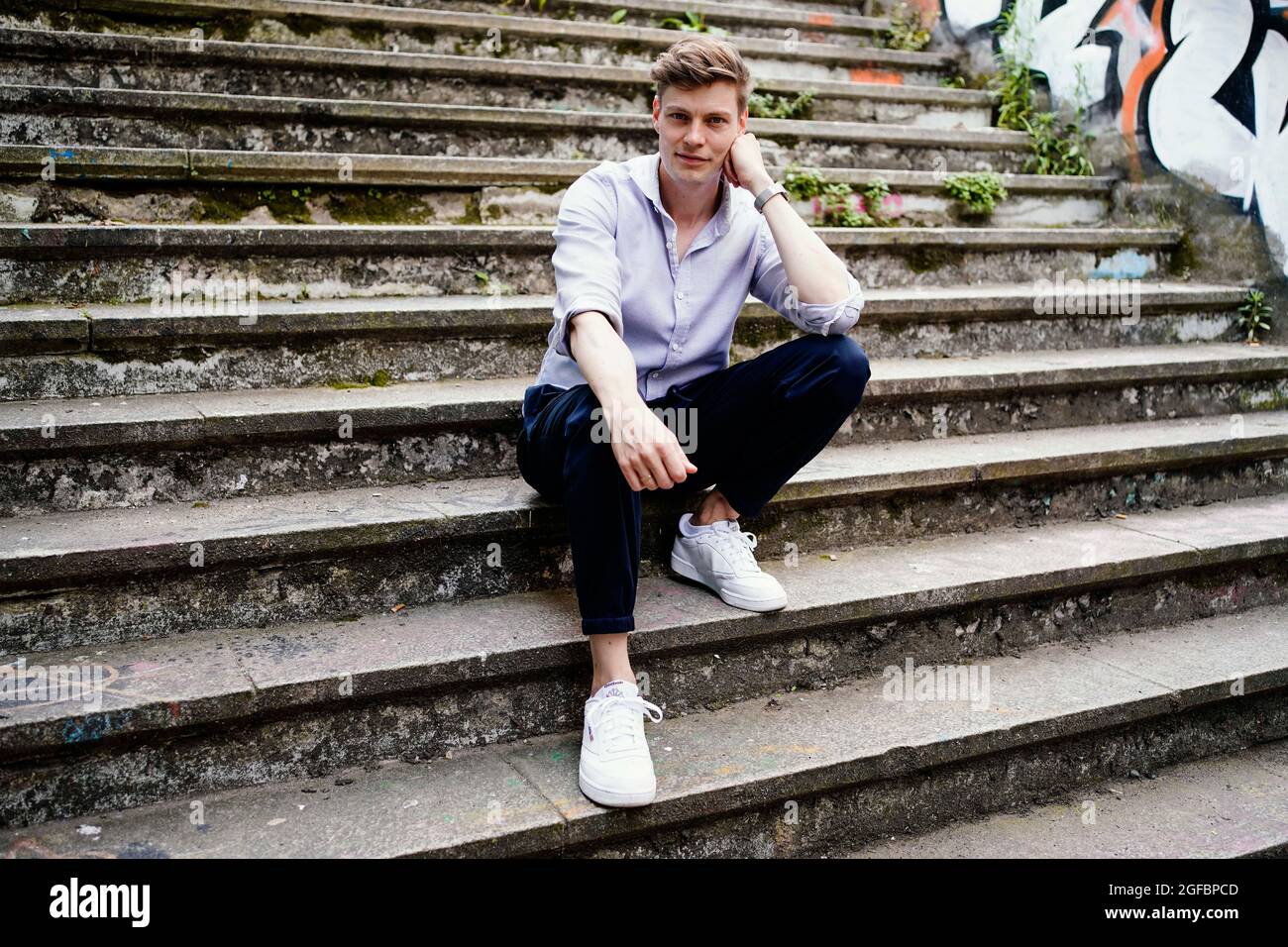 Mannheim, Germany. 13th Aug, 2021. Actor Helgi Schmid sits on a ...