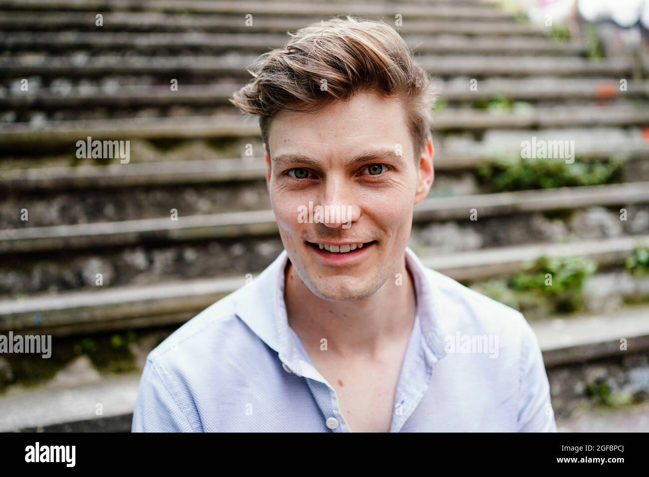 Mannheim, Germany. 13th Aug, 2021. Actor Helgi Schmid sits on a ...