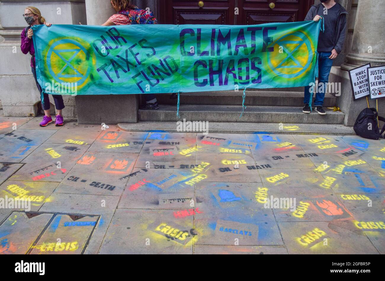 As climate protesters paint banners hi-res stock photography and images ...