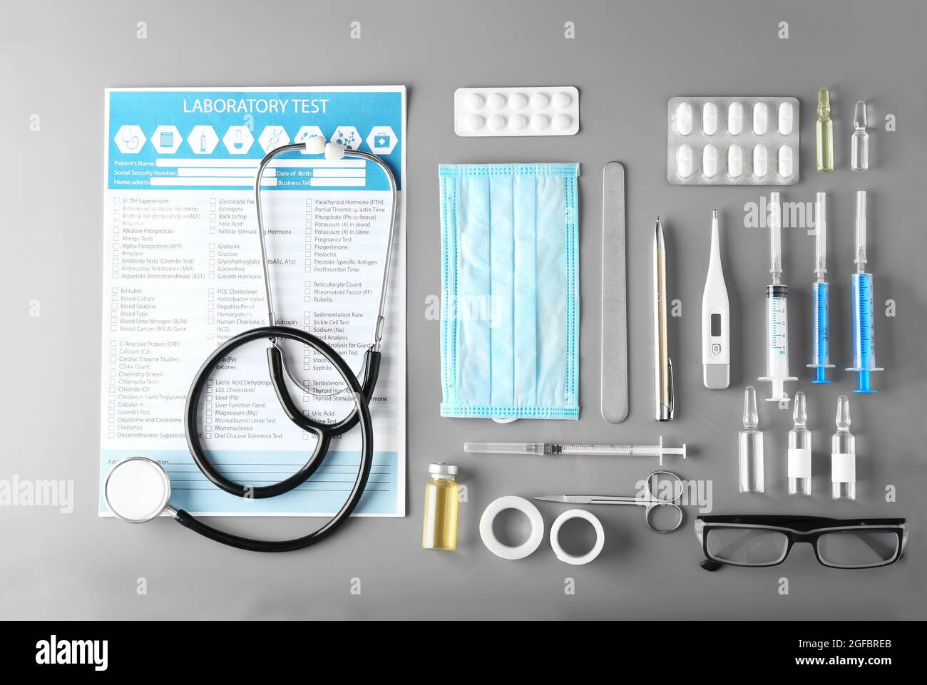 Doctor table with medical items. Flat lay Stock Photo - Alamy