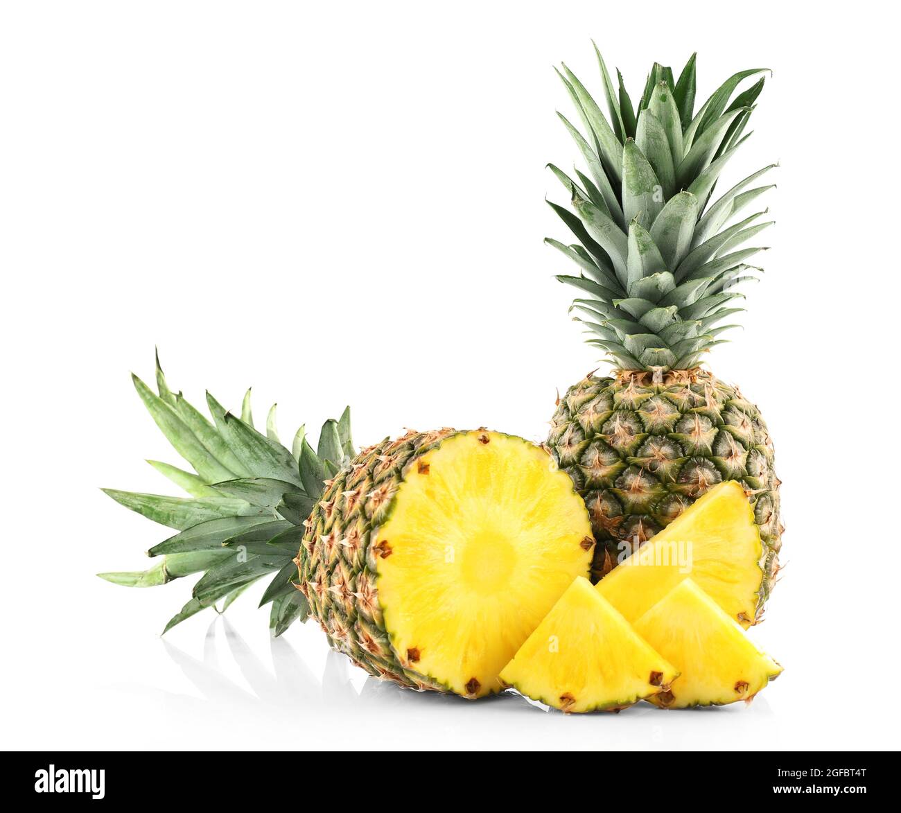Sliced pineapple, isolated on white Stock Photo - Alamy