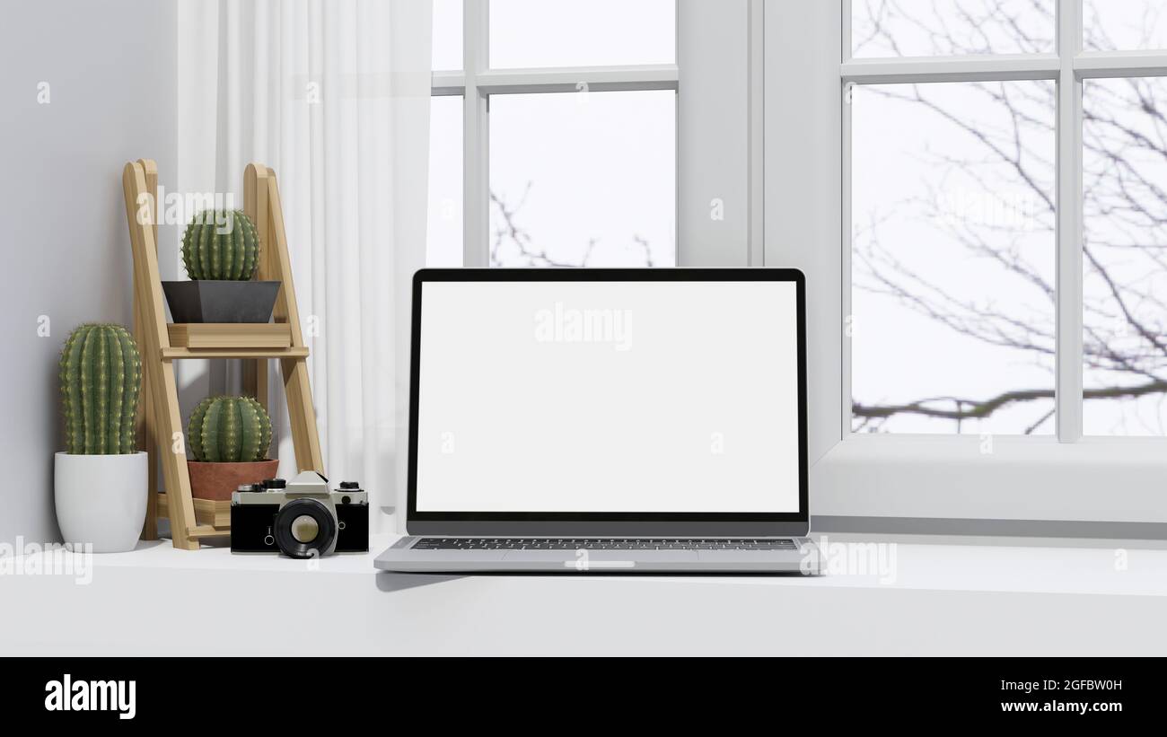 Laptop computer blank screen mockup in white minimal working space ...