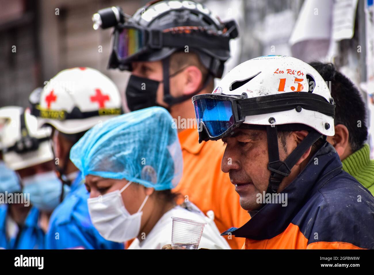 Members of the civil defense and red cross as for several hours ...