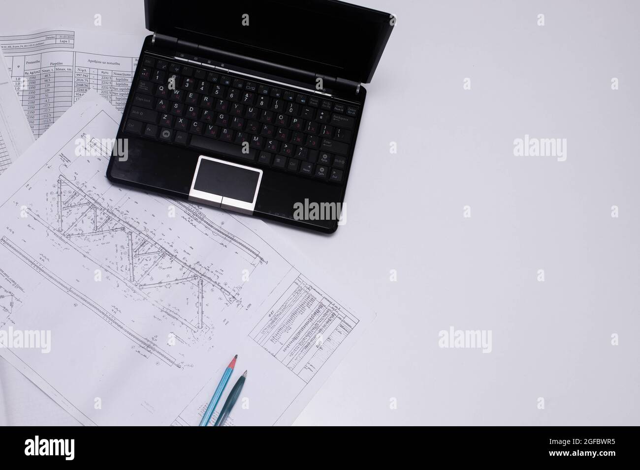 drawings of a construction engineer on a sheet of paper Stock Photo - Alamy