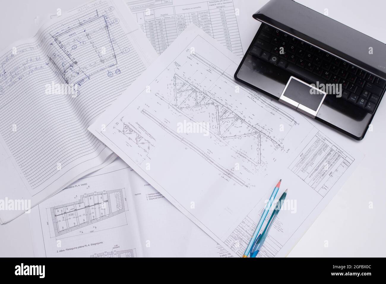 drawings of a construction engineer on a sheet of paper Stock Photo - Alamy