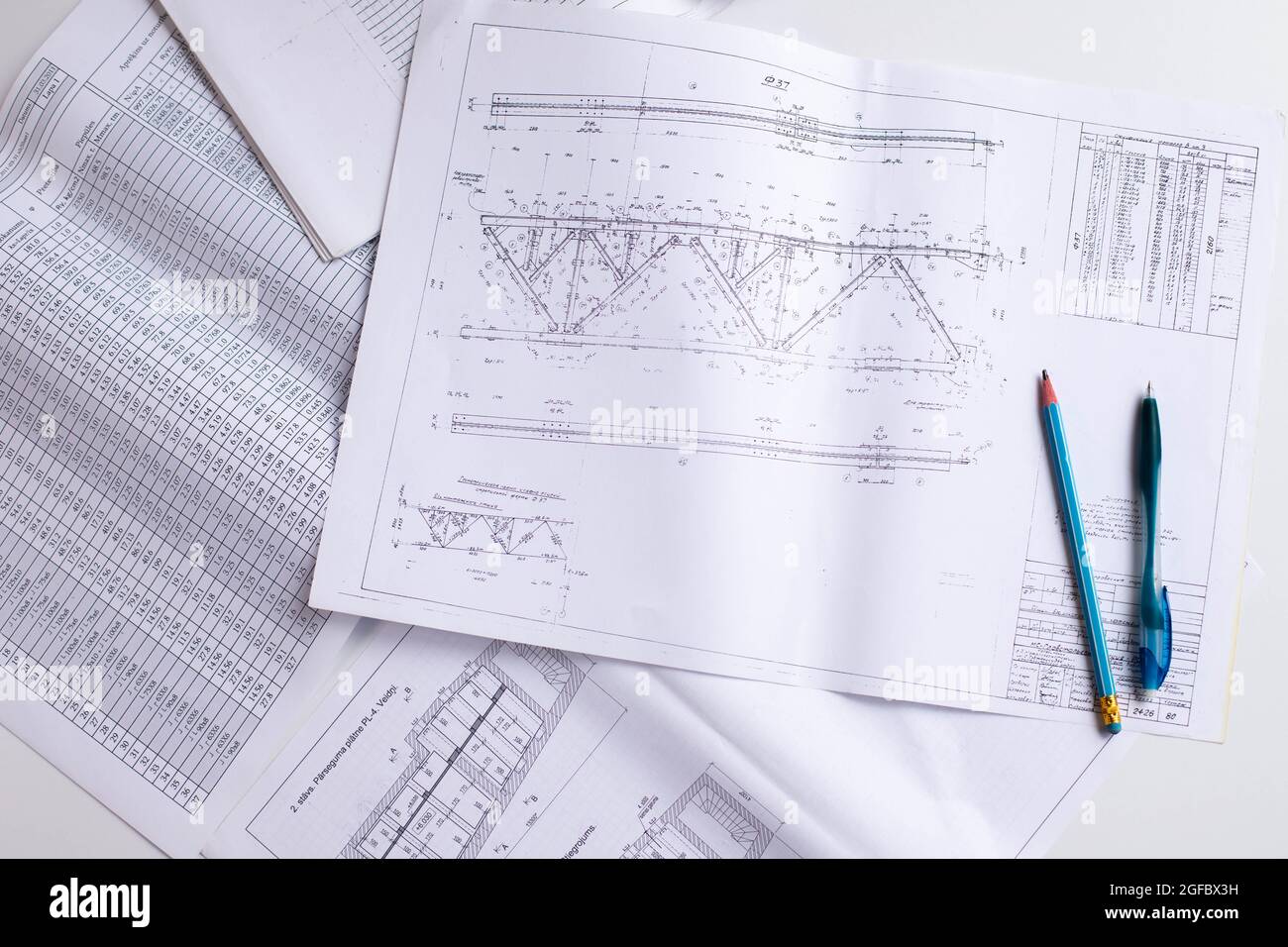 drawings of a construction engineer on a sheet of paper Stock Photo - Alamy