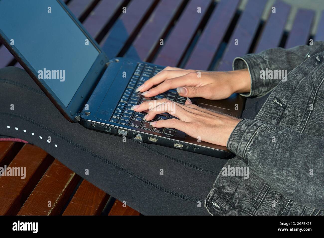 Female hands typing laptop keyboard close up Stock Photo - Alamy